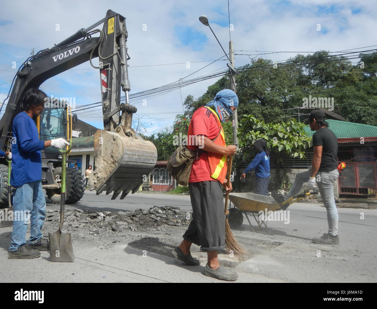 This image captures road construction along the Maharlika Highway in ...
