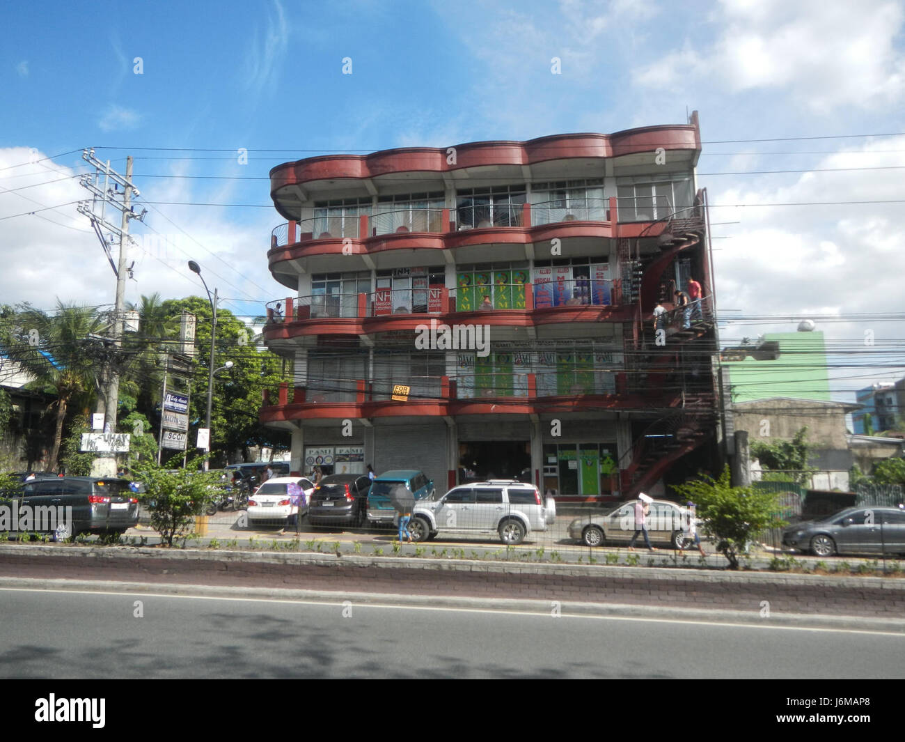 This image captures a view of EDSA East Avenue, located in Pinyahan ...