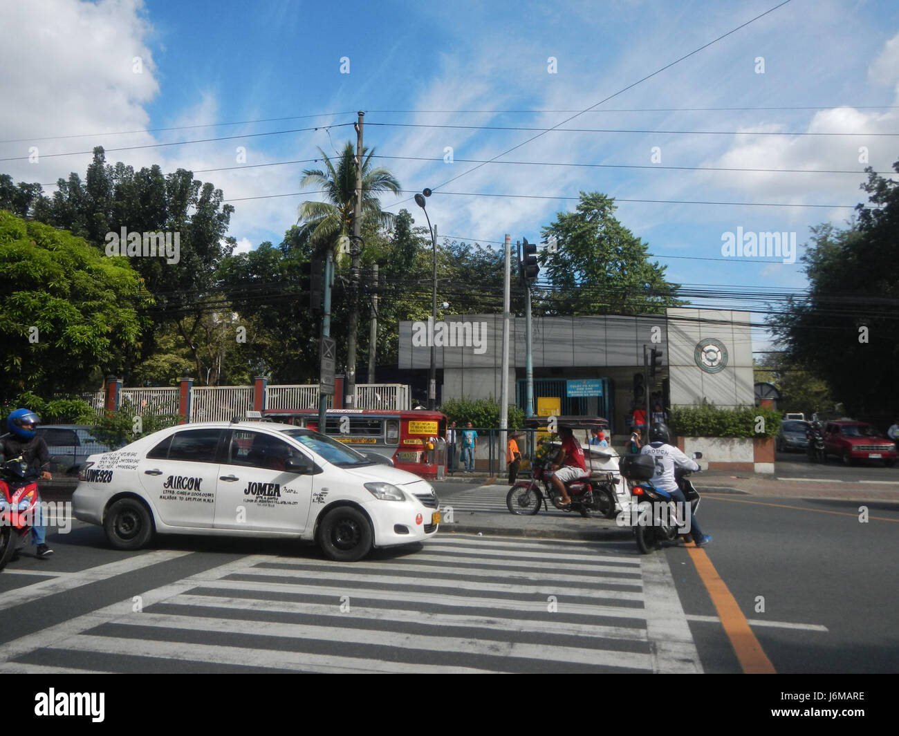 This image depicts the EDSA East Avenue, a major road in Quezon City ...
