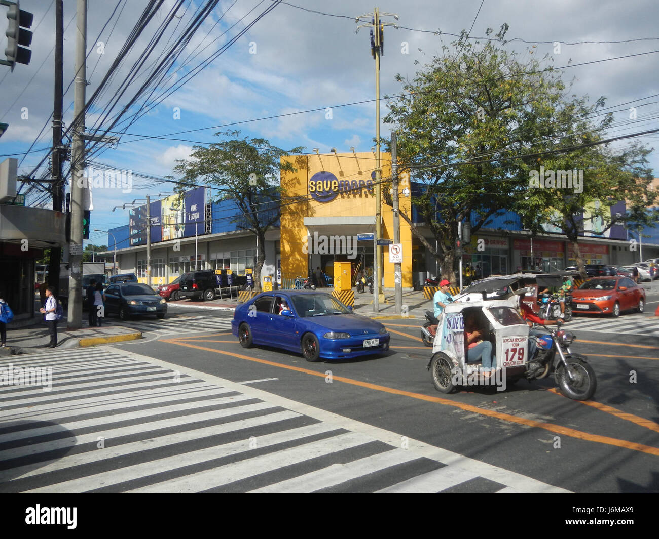 This title references specific areas within Quezon City, including ...