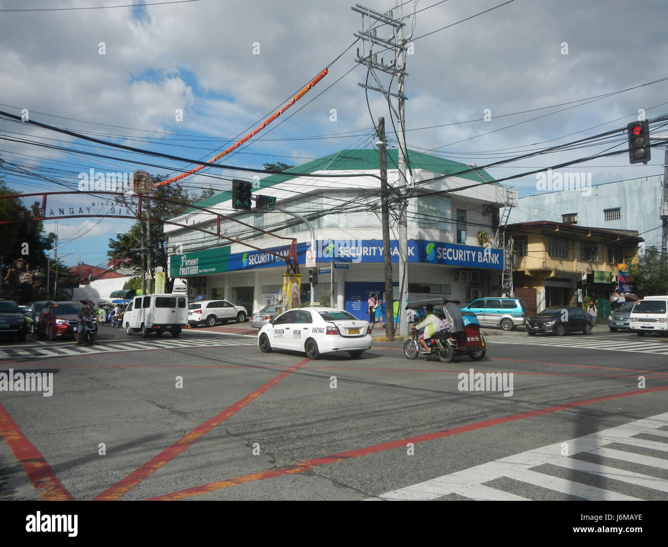 This image captures the area around Barangays Sikatuna Village, V Luna ...
