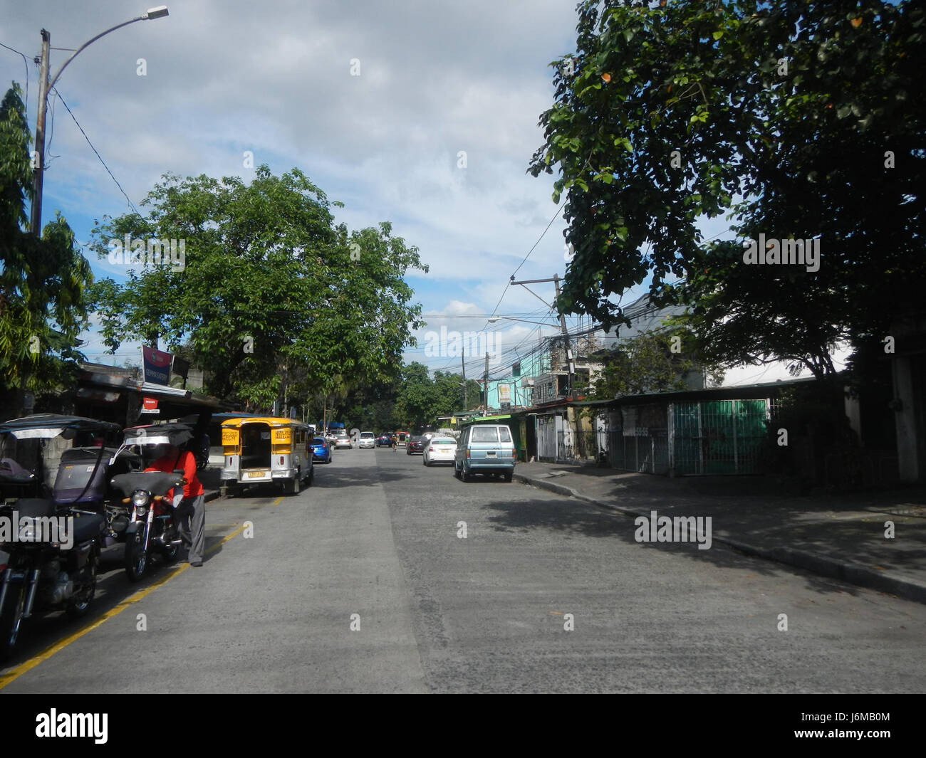 A photograph depicting the Barangays Sikatuna Village, V Luna Avenue ...