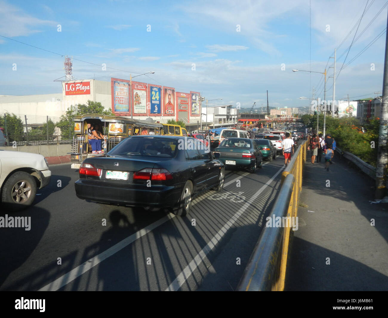 This image depicts the Ortigas Avenue Extension Bridge and its ...