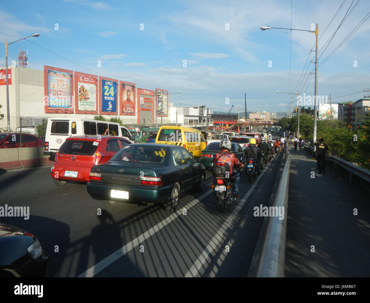 The image shows the Ortigas Avenue Extension Bridge, located in Pasig ...