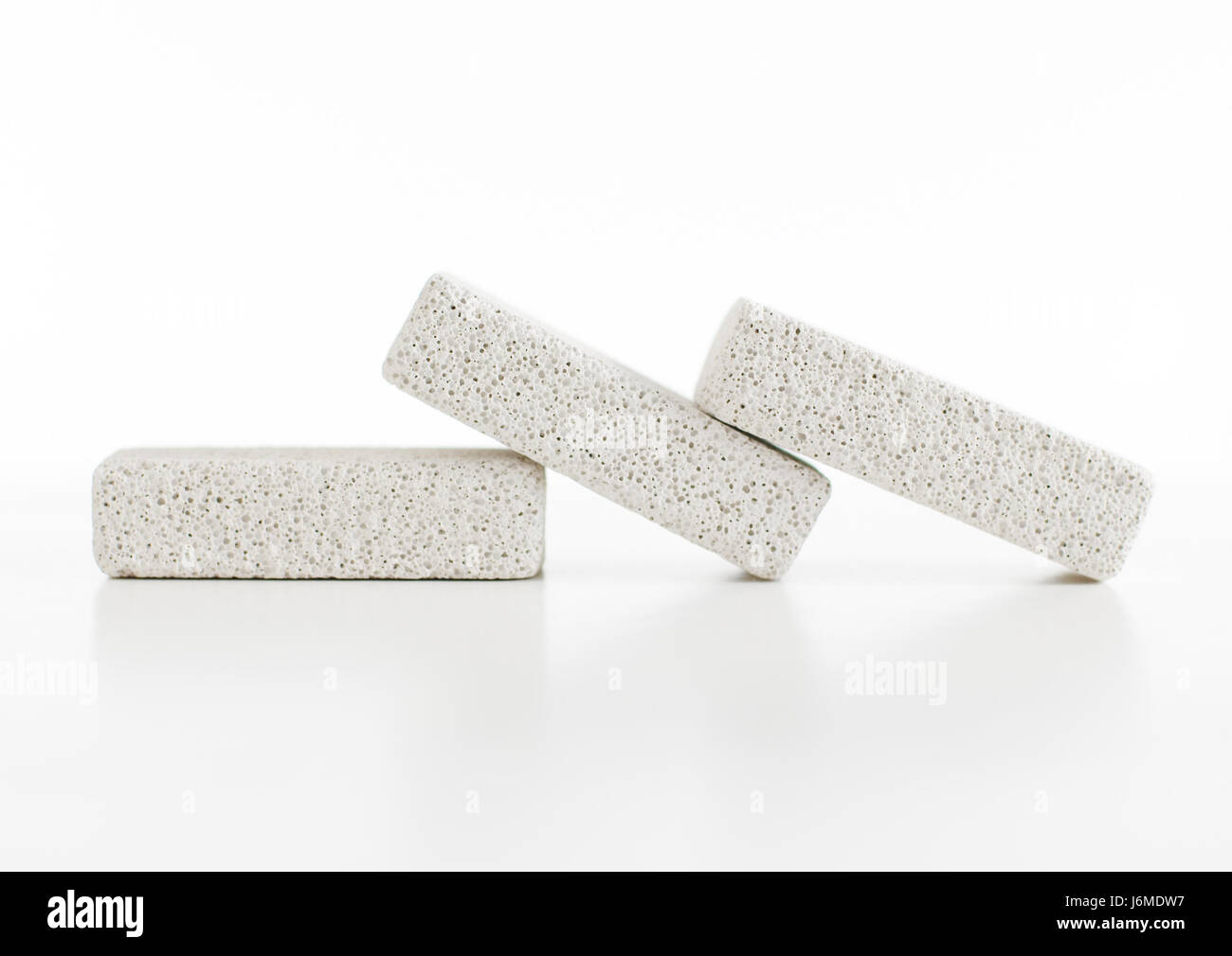 isolated seamless row display pumice backdrop background white stones ...