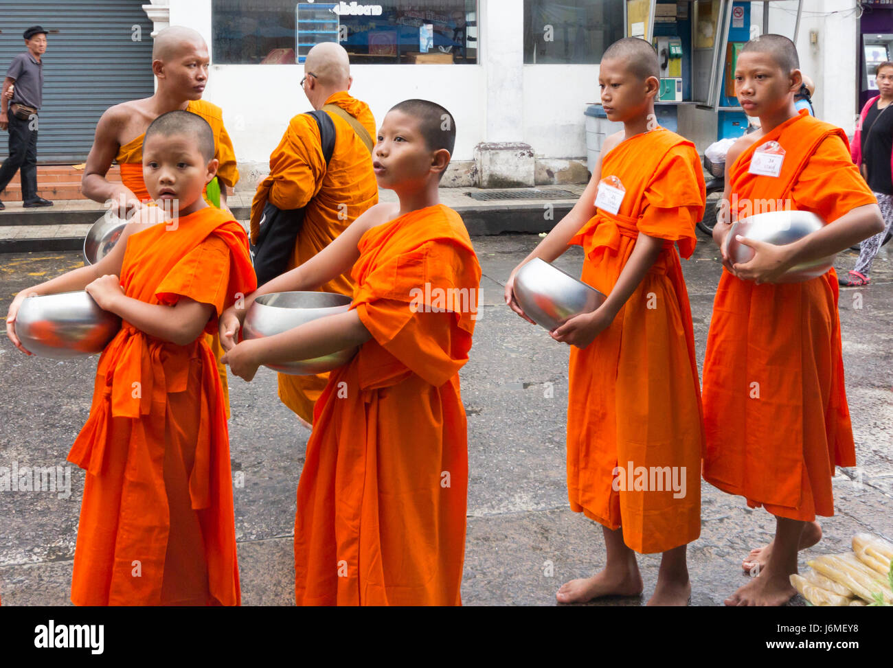 Novice monks walking hi-res stock photography and images - Alamy