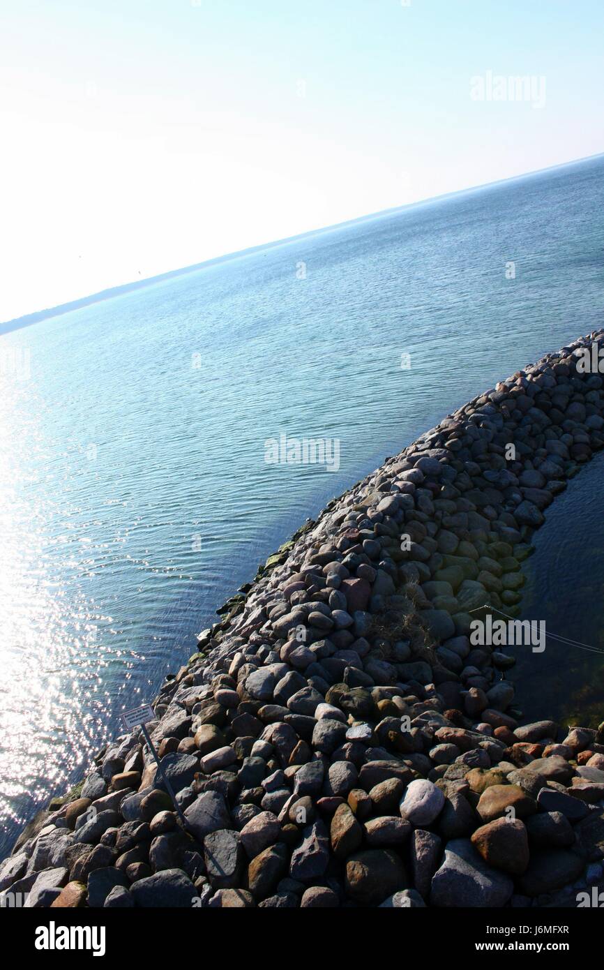 stone beach seaside the beach seashore harbor harbours dam salt water ...