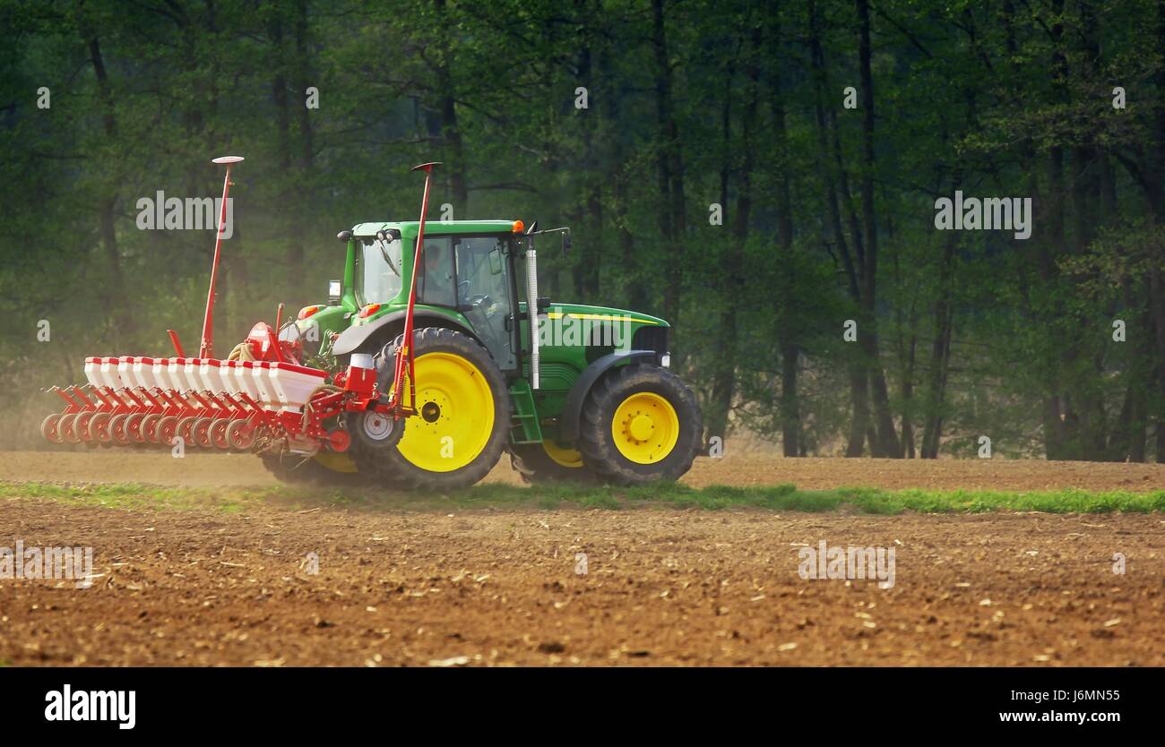 brandenburg acre tractor plough plowing blue tree trees plant engine ...