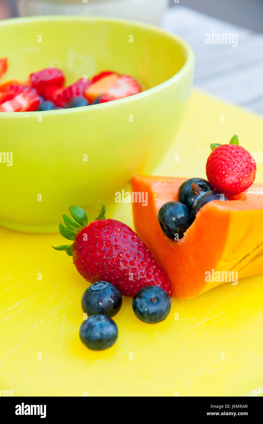 Mixed fruit and oatmeal breakfast Stock Photo - Alamy