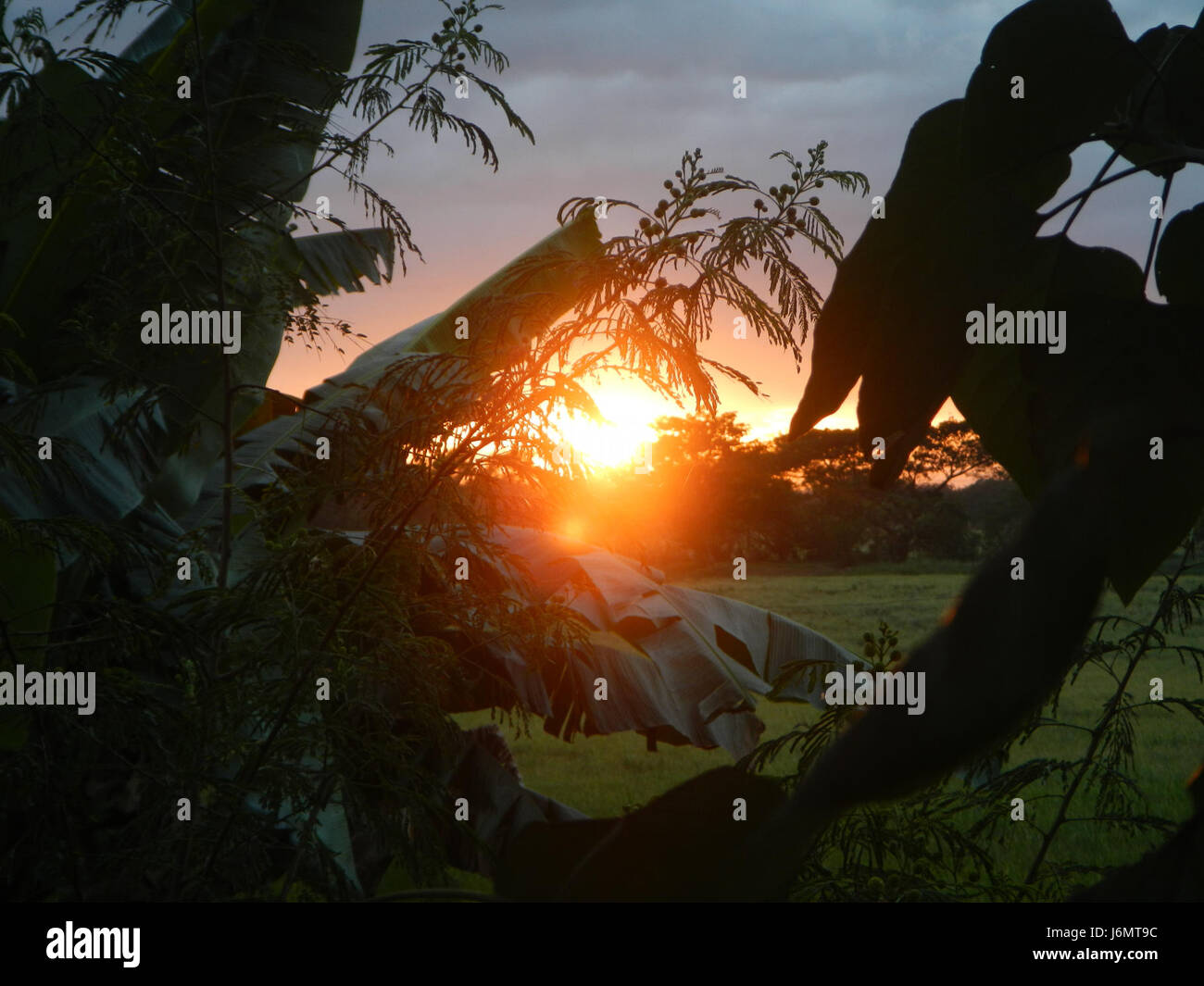 This image showcases a scenic view of a sunset in San Miguel, Bulacan ...
