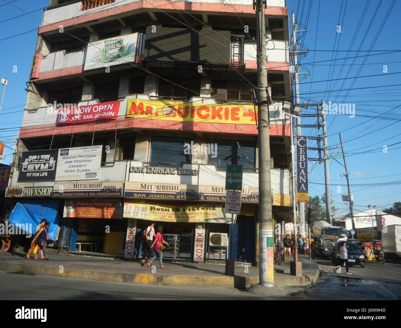 This image shows a scene from the streets of Pasig City, including San ...