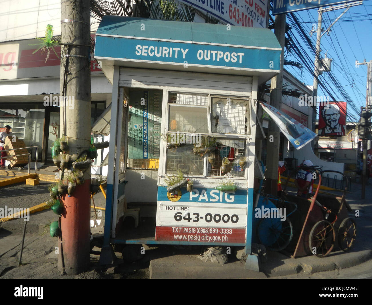 This image captures a busy street scene in Pasig City, located in Metro ...