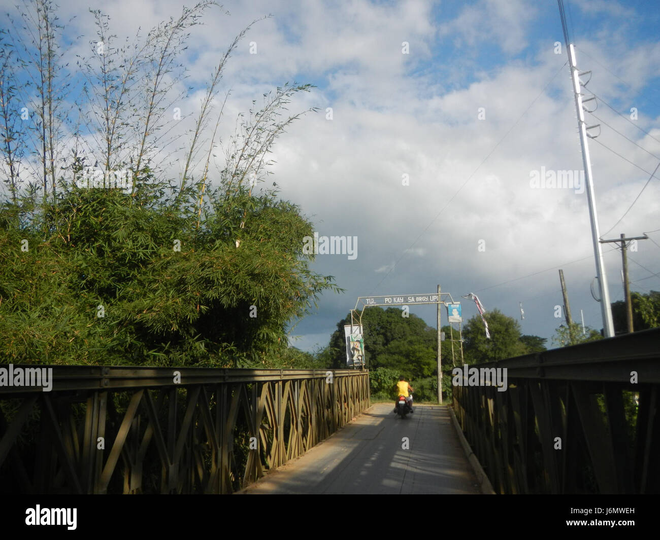 The image shows the expansive paddy fields and grasslands of Upig ...