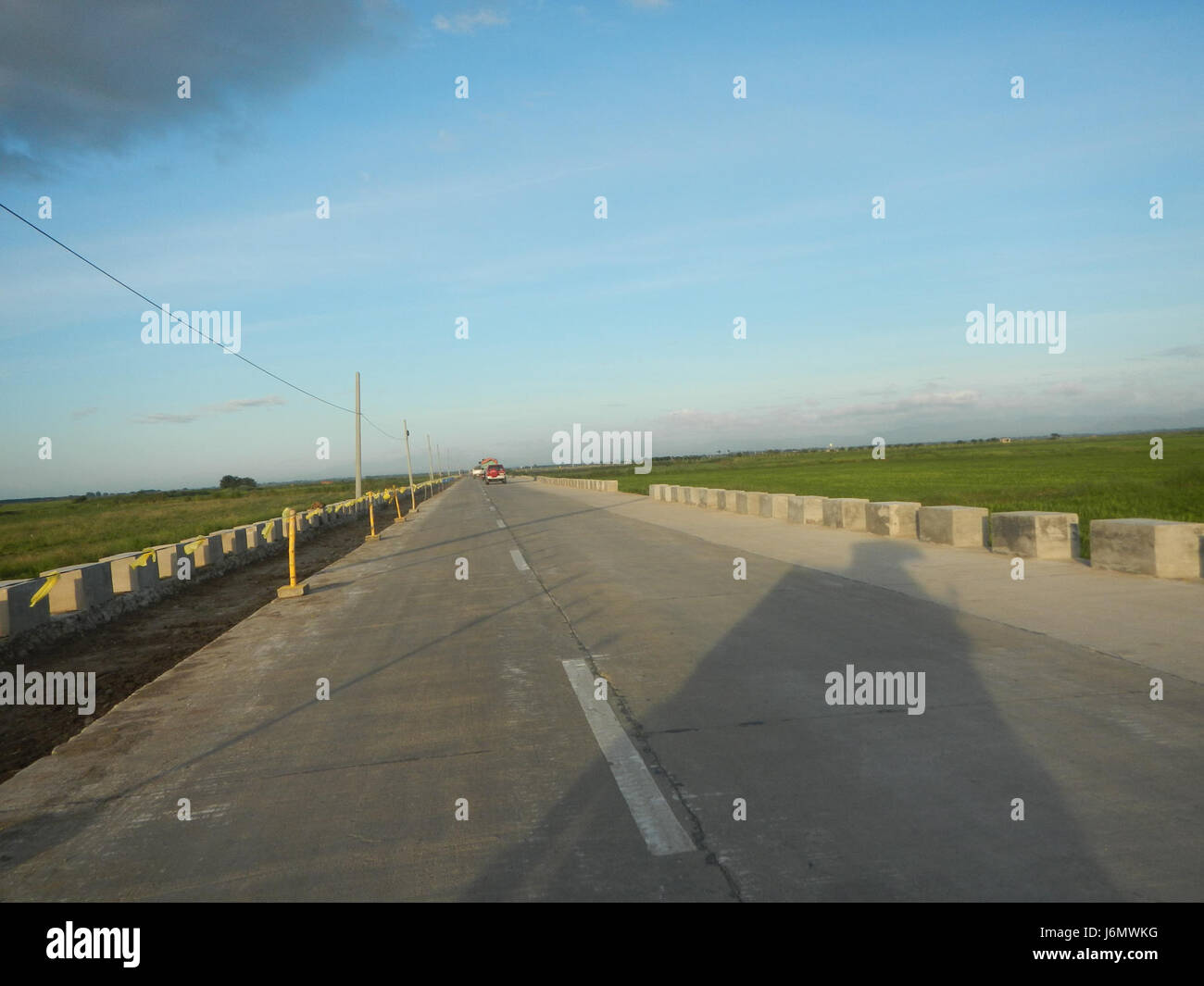 This image represents the paddy fields and roads in the rural areas of ...