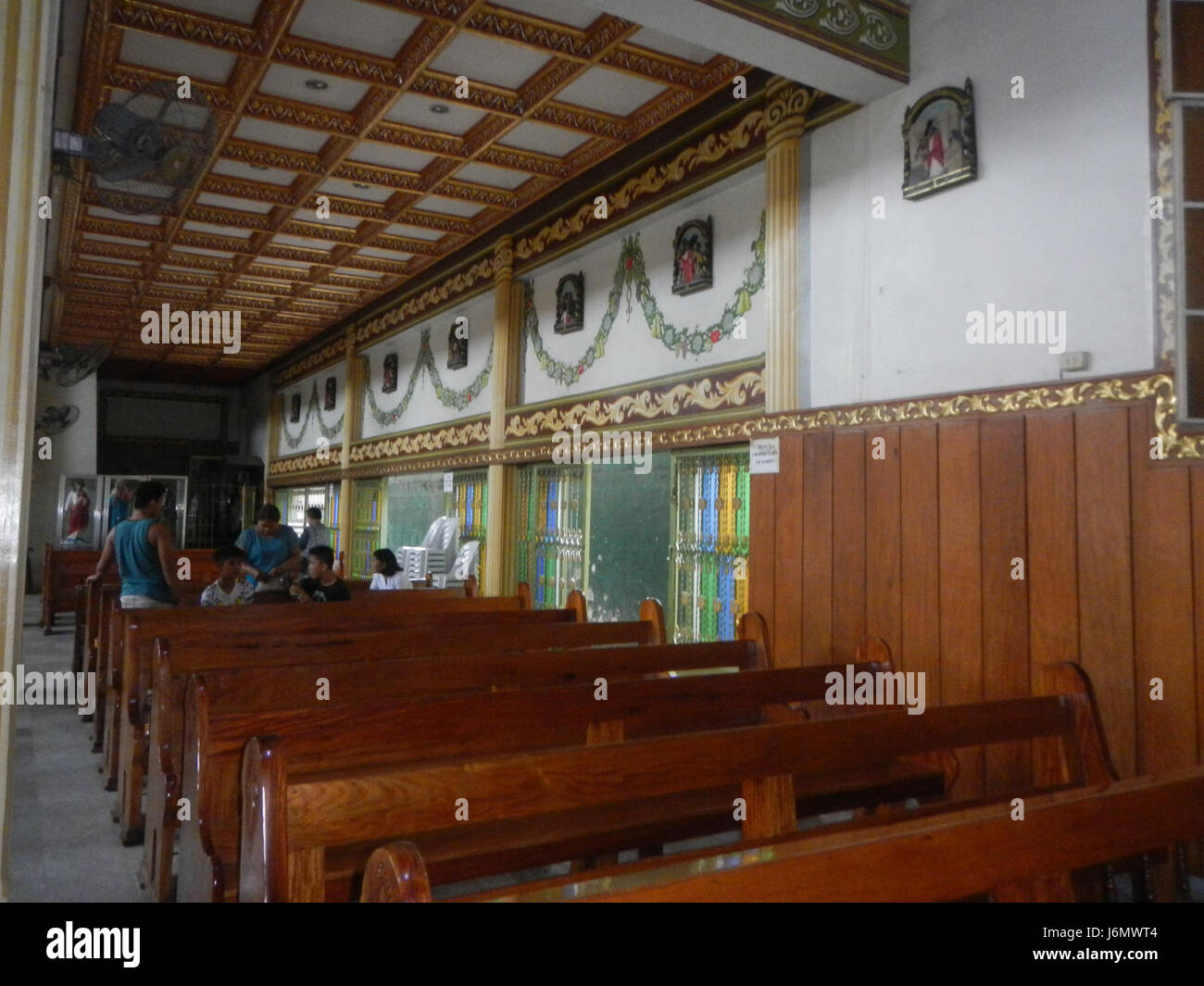 This image depicts the interior of the Immaculate Conception Parish ...