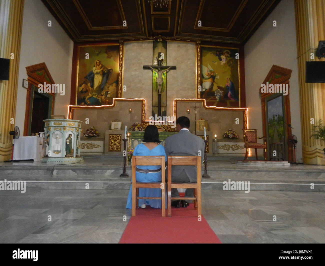 This image presents the interior of the Immaculate Conception Parish ...