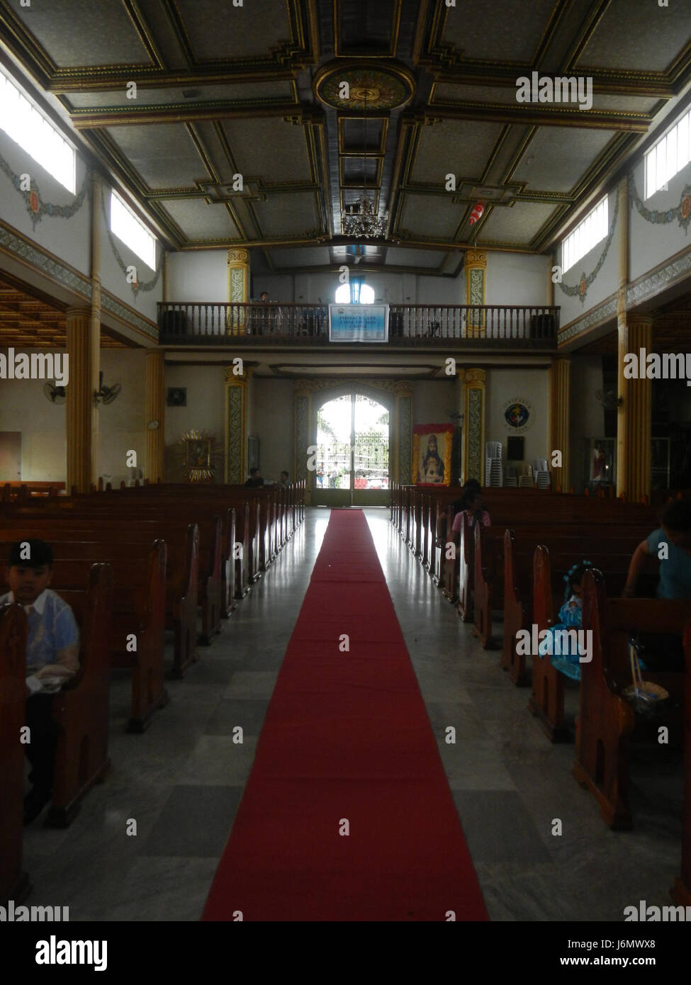 This image depicts the interior of the Immaculate Conception Parish ...