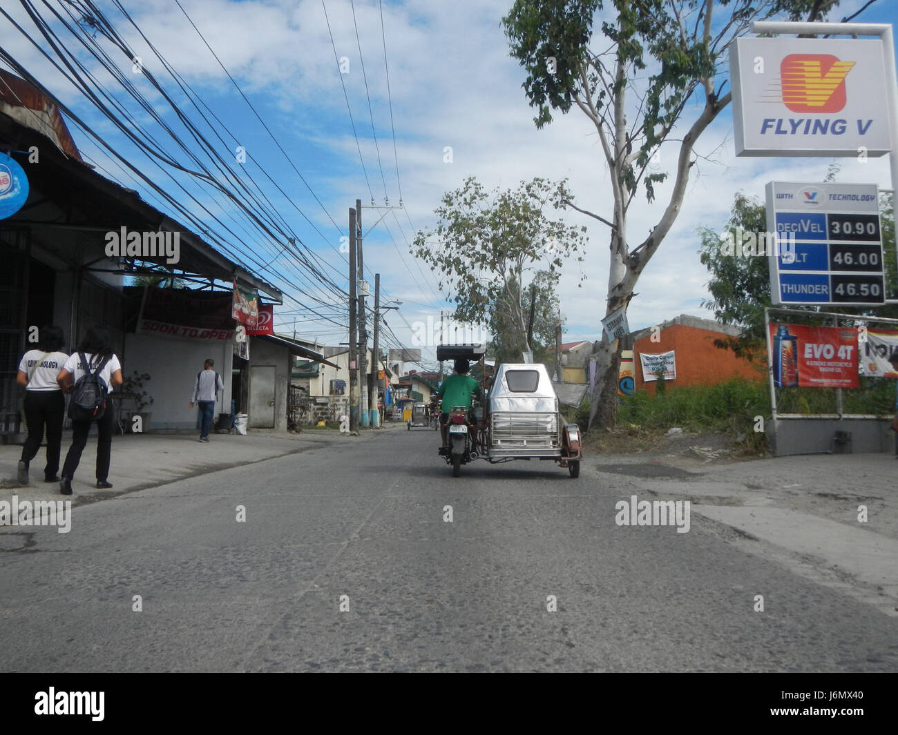 This title refers to a specific location along a road in Guiguinto, Bulacan, Philippines. The ...