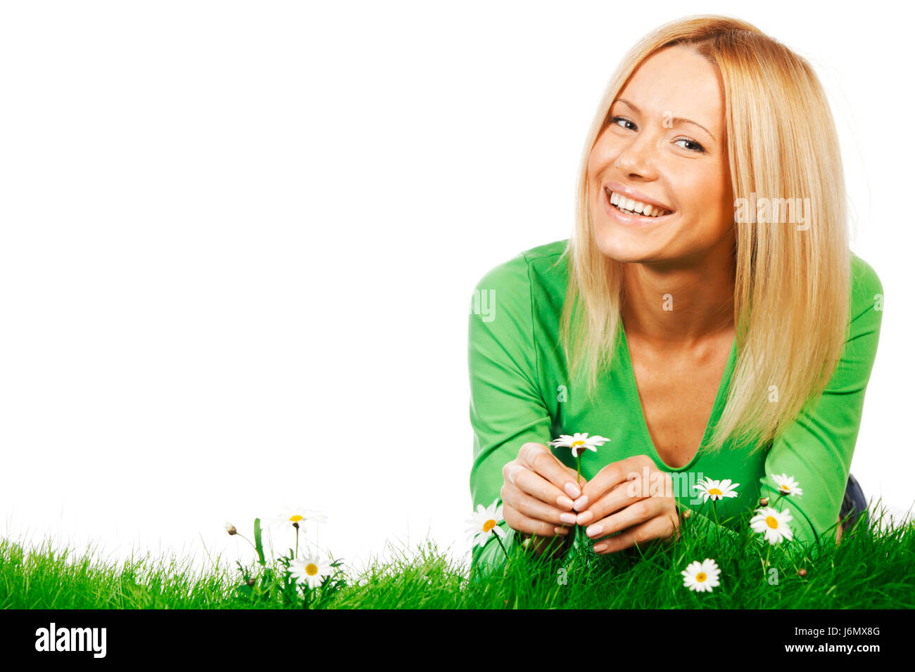 Happy Young Woman Lying On Grass With Chamomile Flowers Isolated On