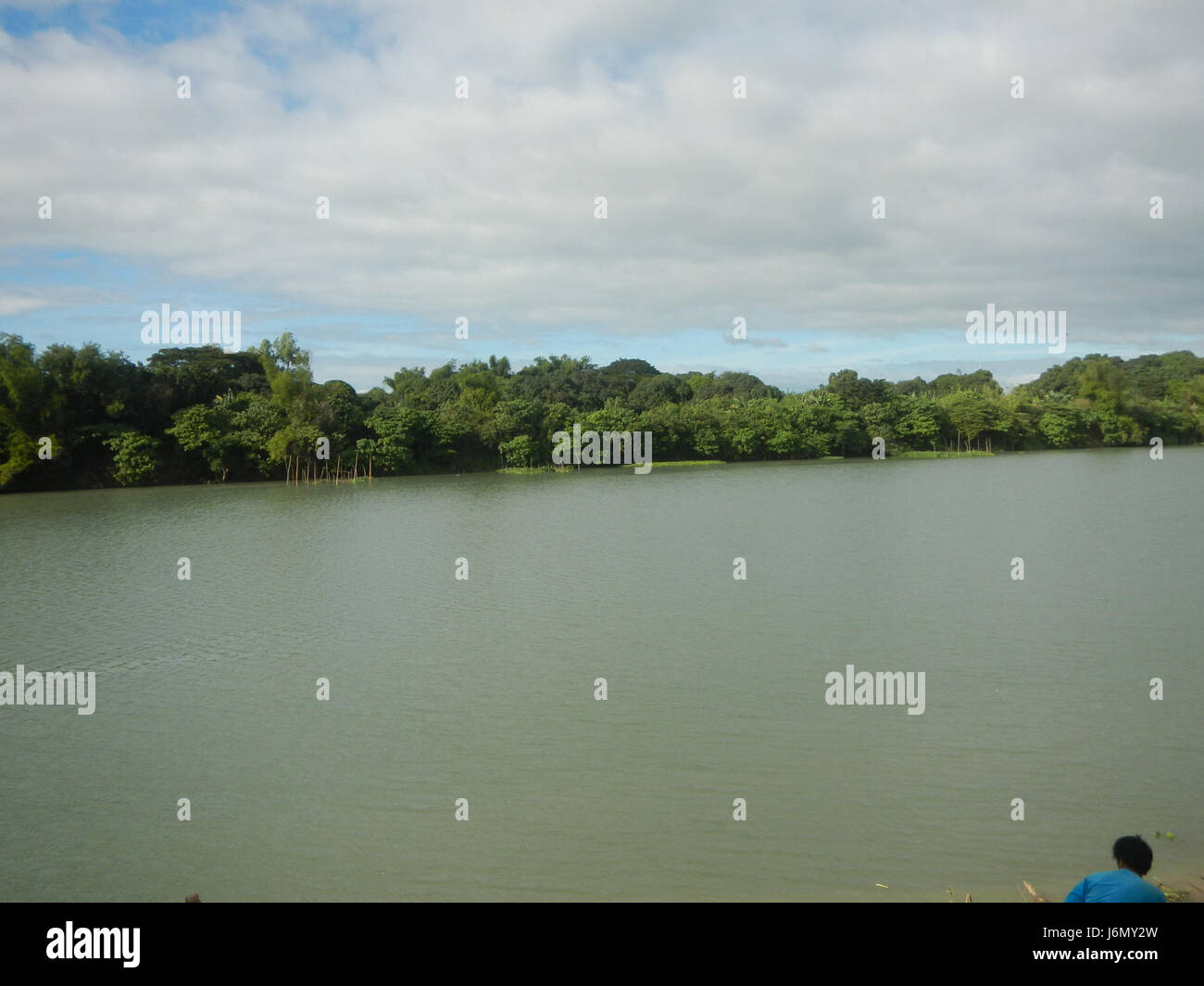 This image shows the riprap construction along the riverbanks of the ...