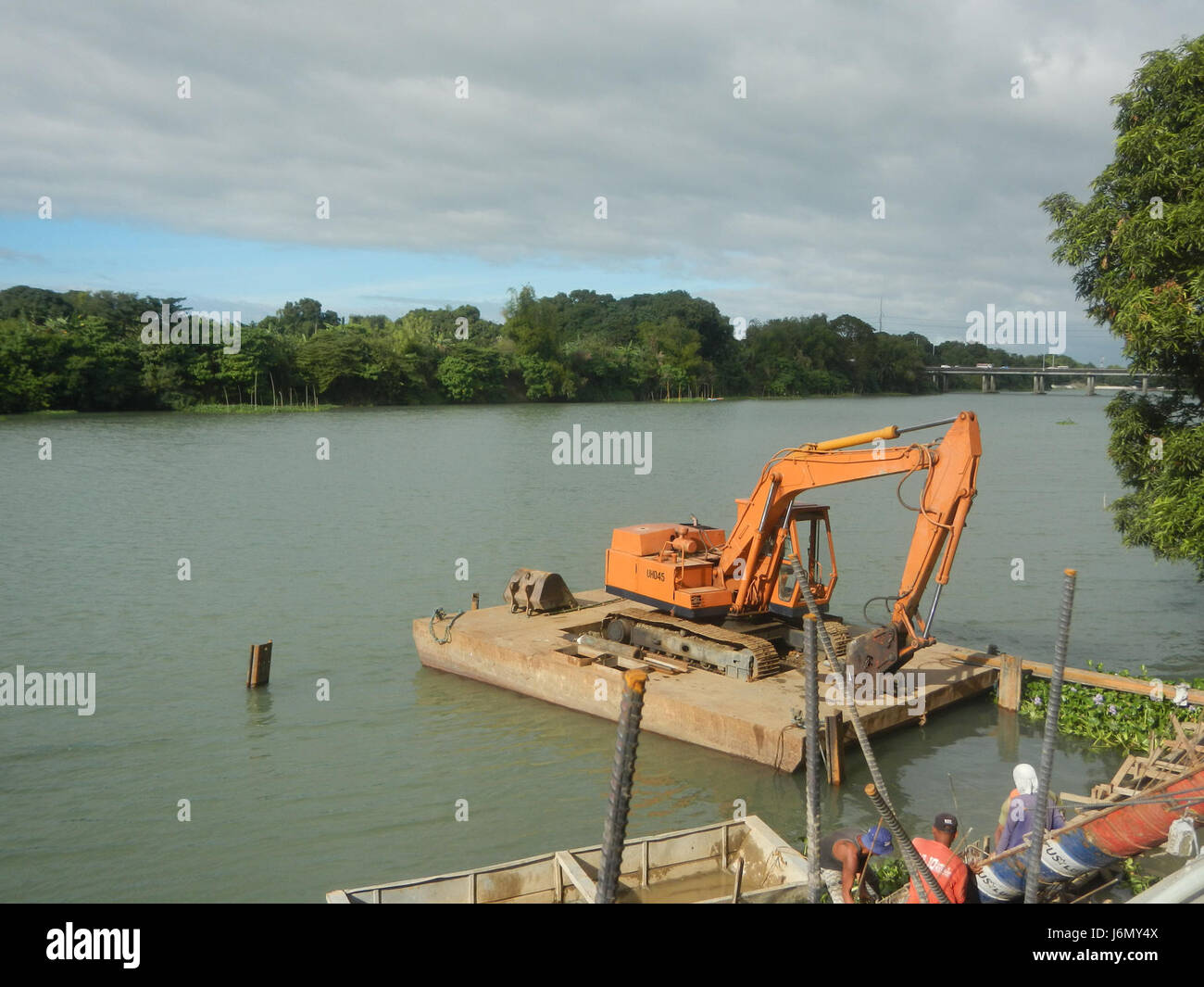 Riprap construction along the Pulilan Riverbanks in Bulacan is part of ...