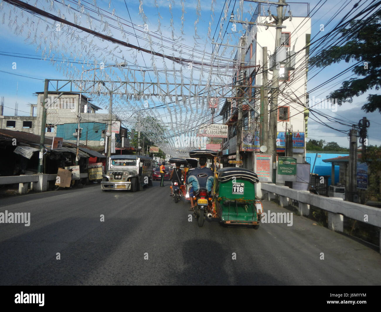 This image shows the construction of a bypass bridge on the road ...