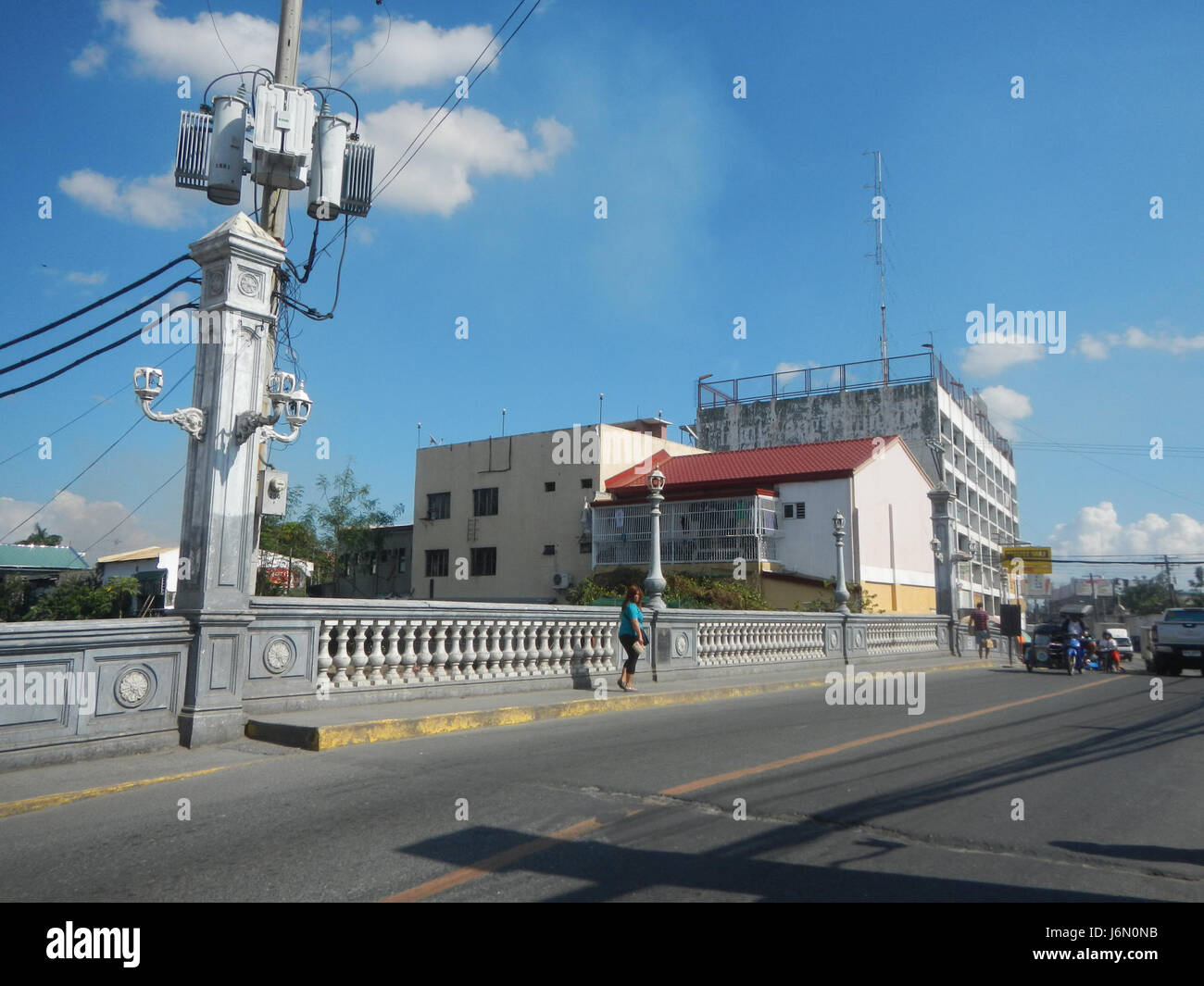 This photograph captures the first concrete pavement and the Baluyut ...