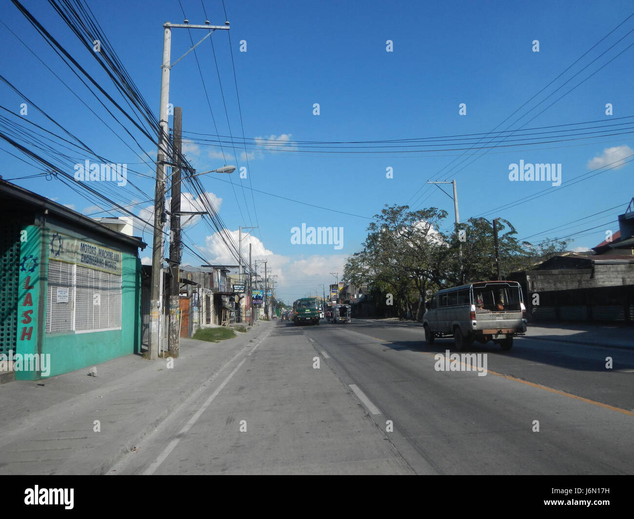 This image depicts a scene from San Fernando City in Pampanga ...