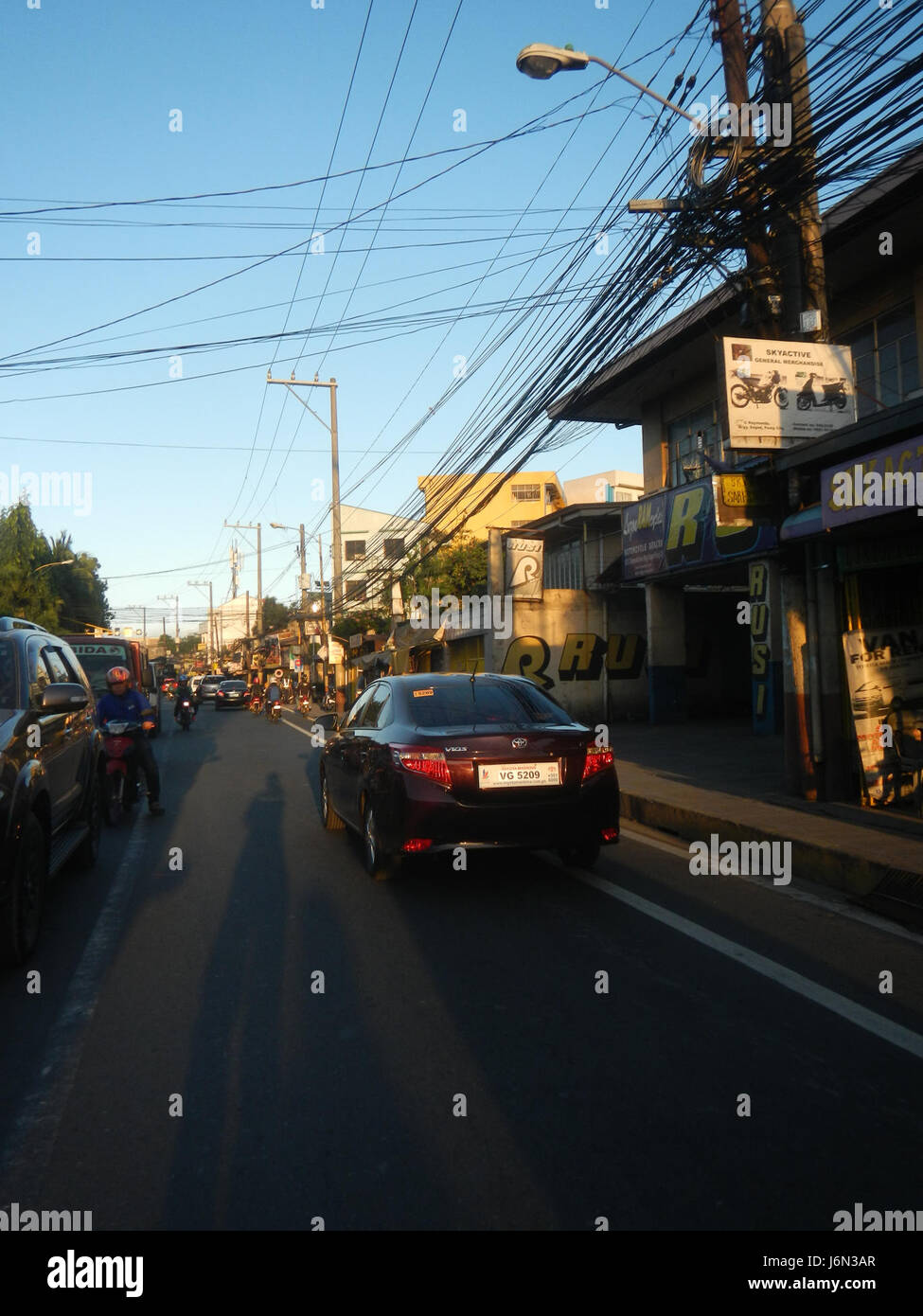 This image represents a street scene from C. Raymundo Avenue in Pasig ...