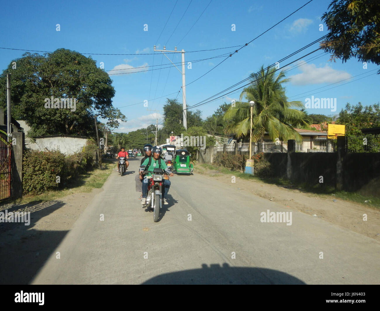 This location in Pandi, Bulacan, Philippines, highlights a road area ...