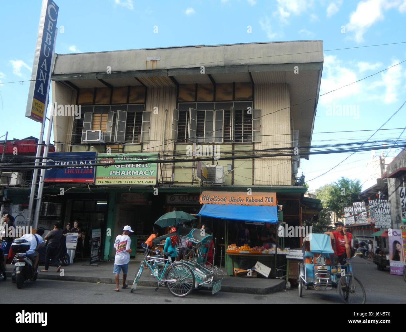 A photograph of the Mabini Street market in Caloocan City, showing the ...