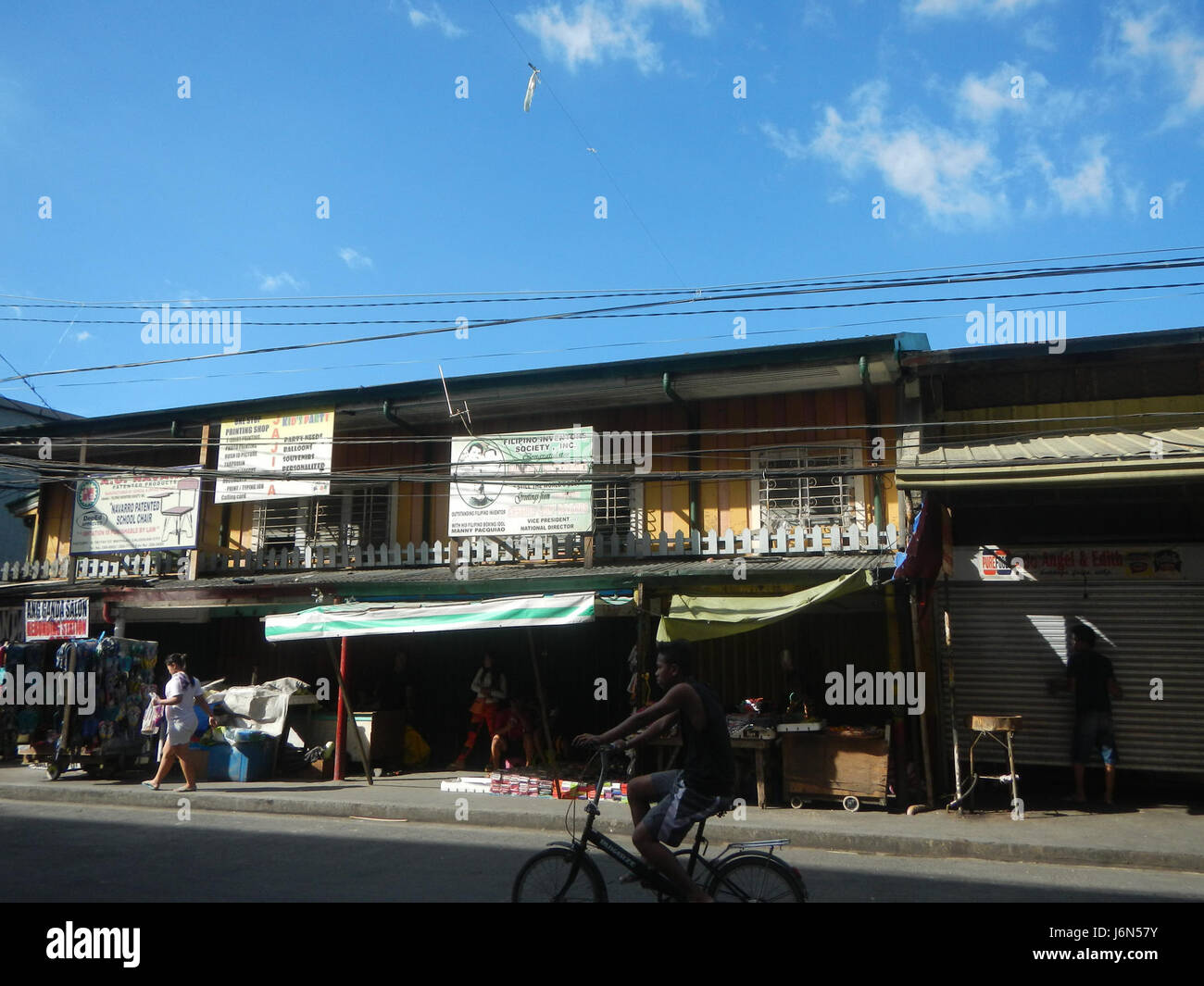 A photograph of the market area at J. P. Rizal Mabini Street in ...