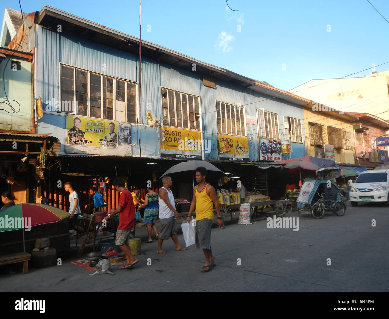 The title refers to a market located along Juan Luna Street in ...