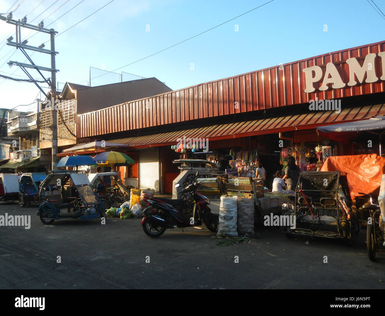 A photograph showing the Pampanga Market on Juan Luna Street in ...