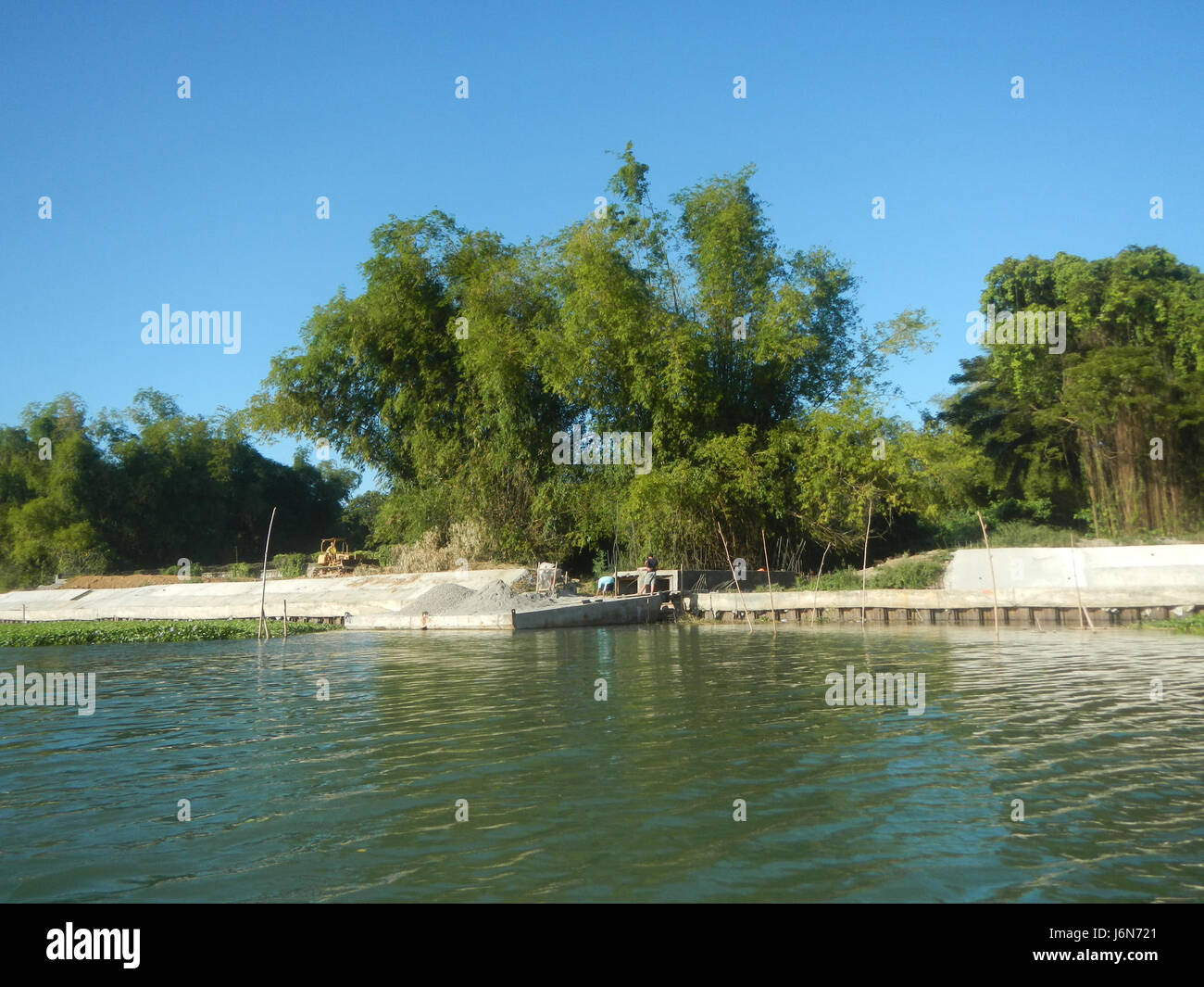 Pulilan, located in Bulacan, features riverbank riprap construction, a ...
