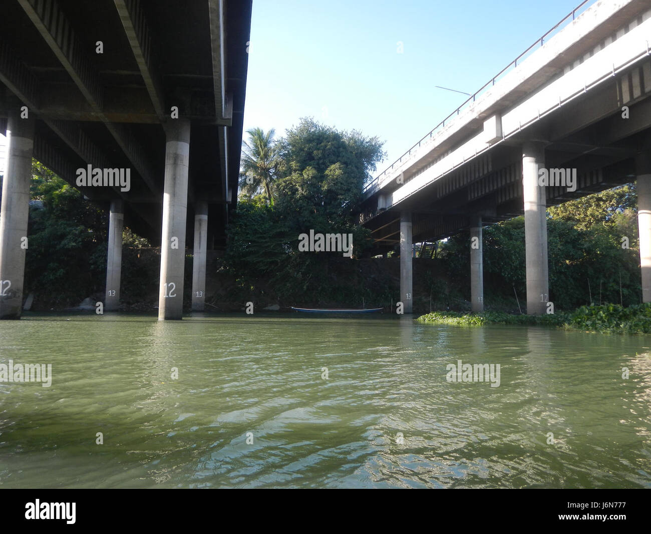 This image depicts the construction of a riprap along the riverbanks of ...