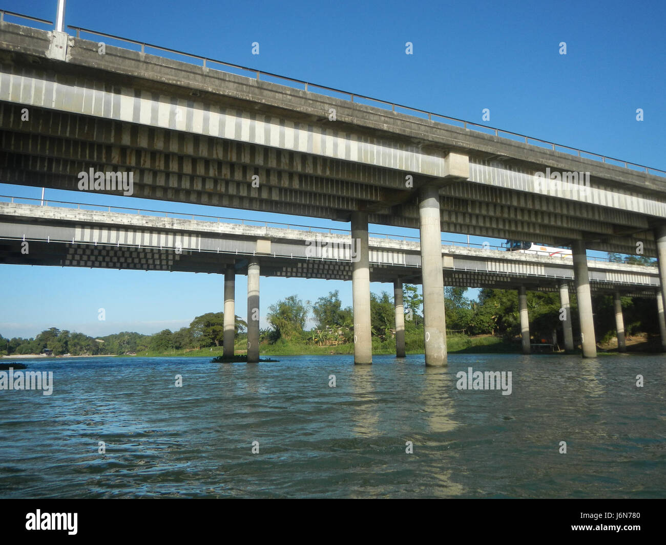 This image depicts the riverbanks near Pulilan and Plaridel in Bulacan ...