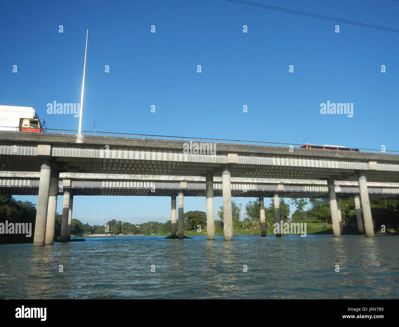 This image depicts the ongoing riprap construction along the riverbanks ...