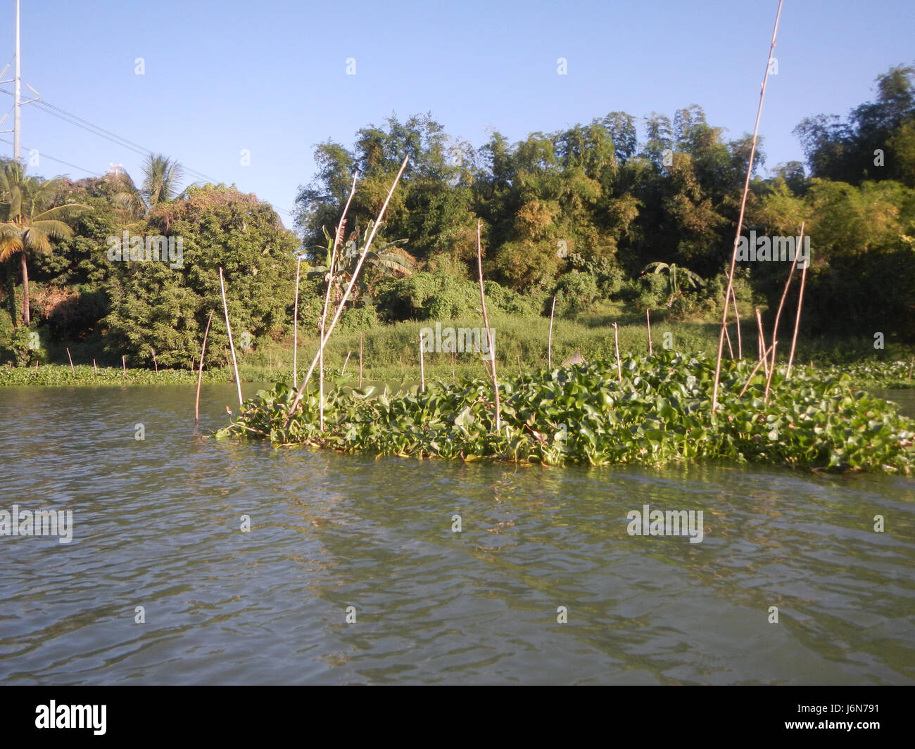 This image shows the riprap construction along the riverbanks of the ...