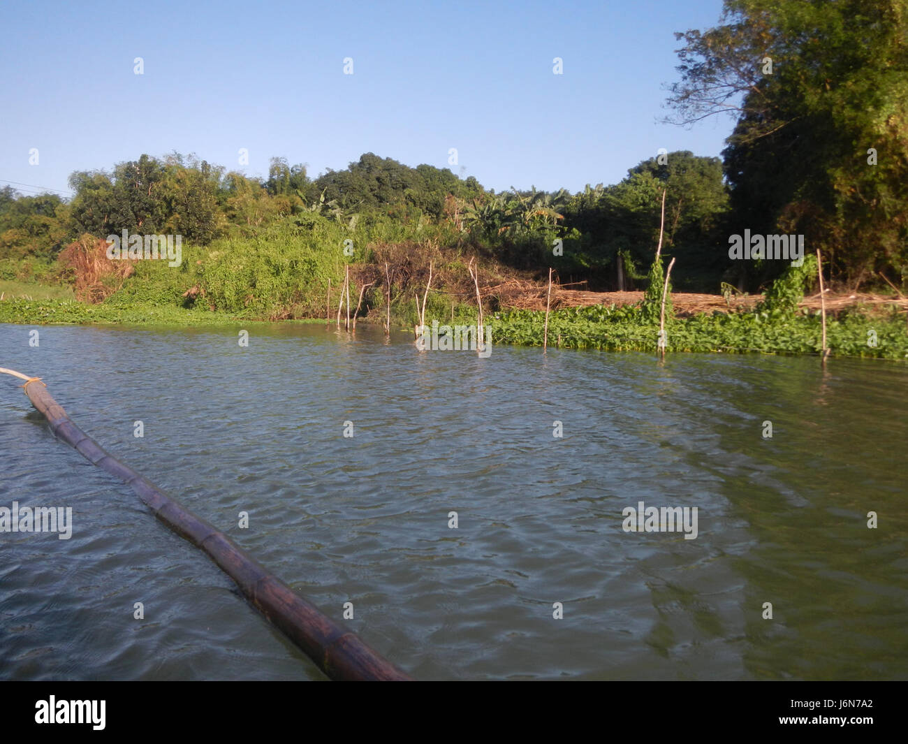 A construction project involving riprap work along the riverbanks in ...
