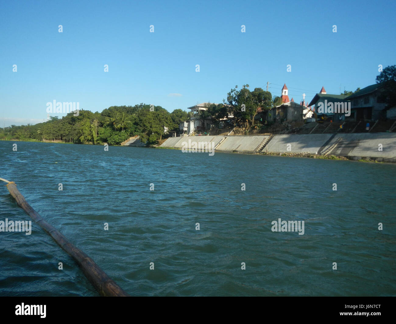 This image documents the construction of riprap along the riverbanks in ...