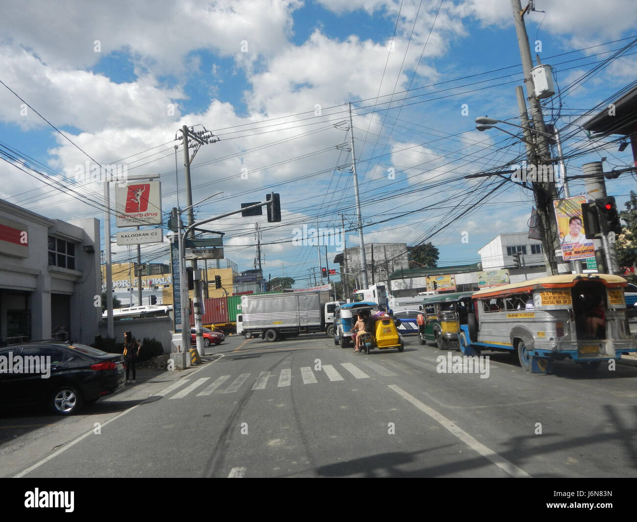 This image depicts A. Mabini Street in Caloocan City, Philippines ...