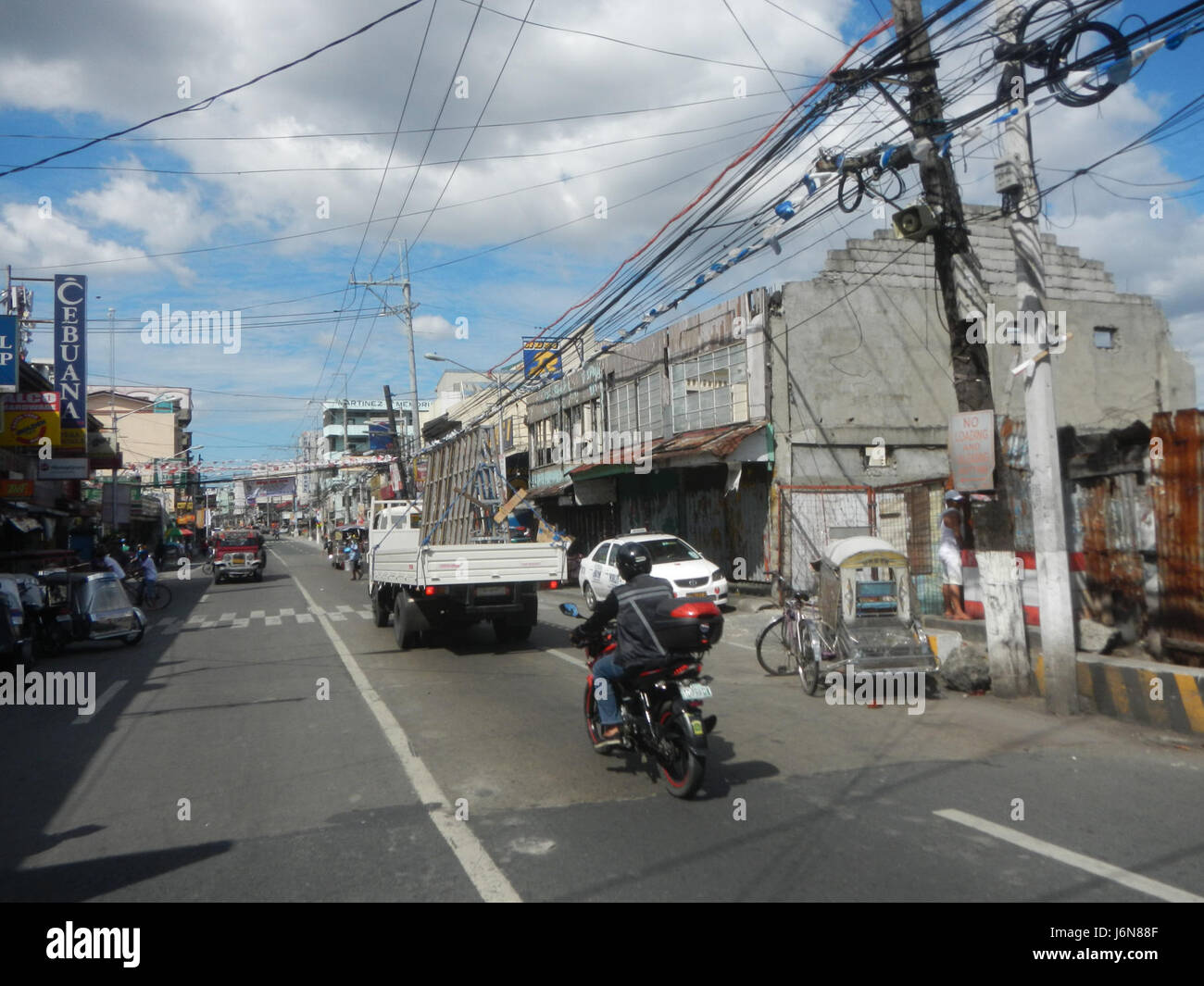 A. Mabini Street in Caloocan City, Philippines, is a prominent road ...