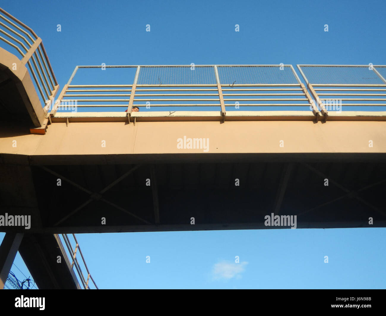 The image shows a pedestrian footbridge located on Capulong Marcos Road ...