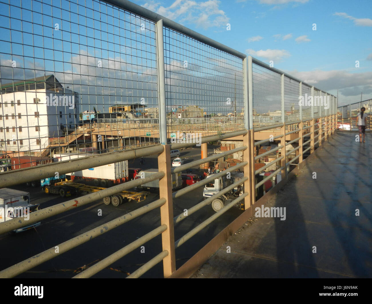 This image shows the pedestrian footbridge on C-2 Capulong Marcos Road ...