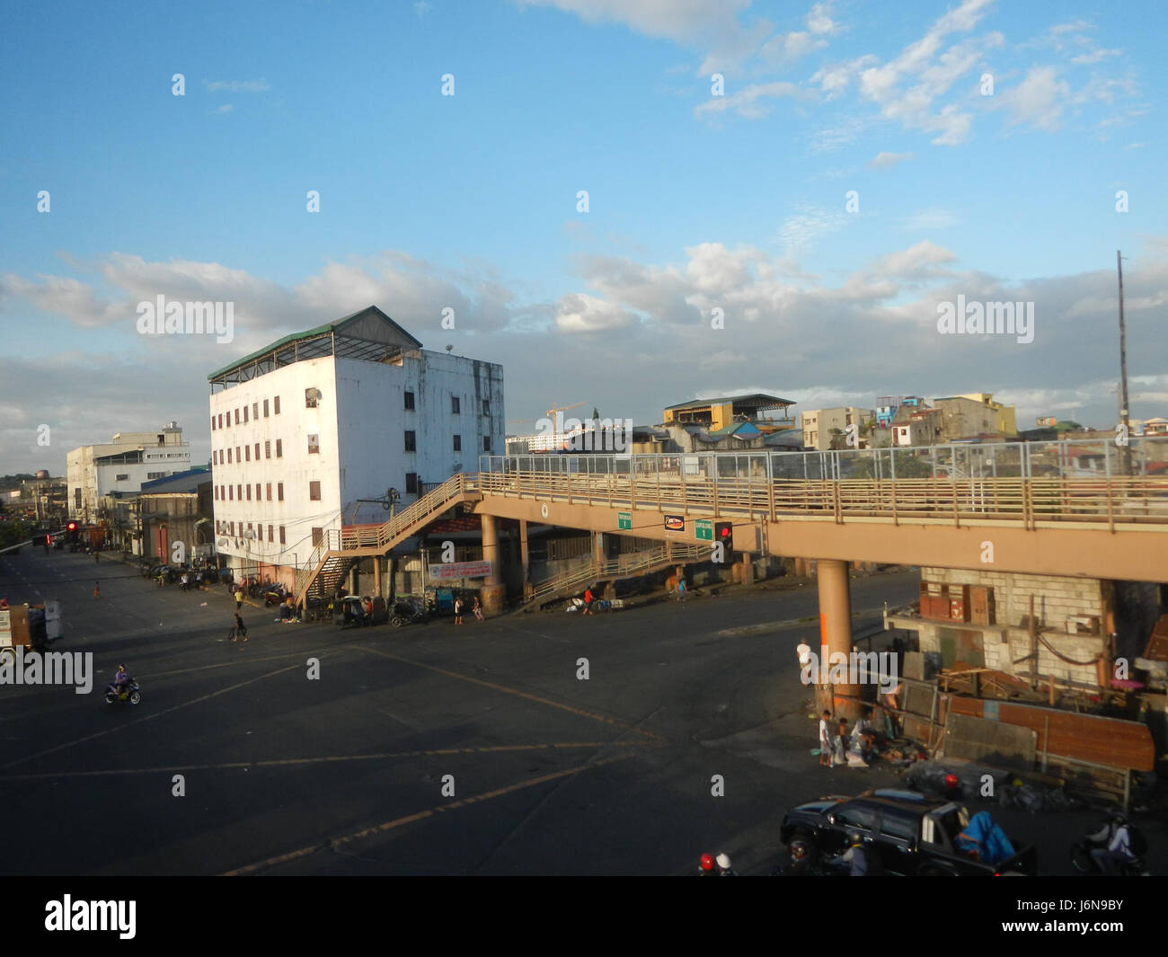 The image depicts the pedestrian footbridge at C-2 Capulong, located on ...