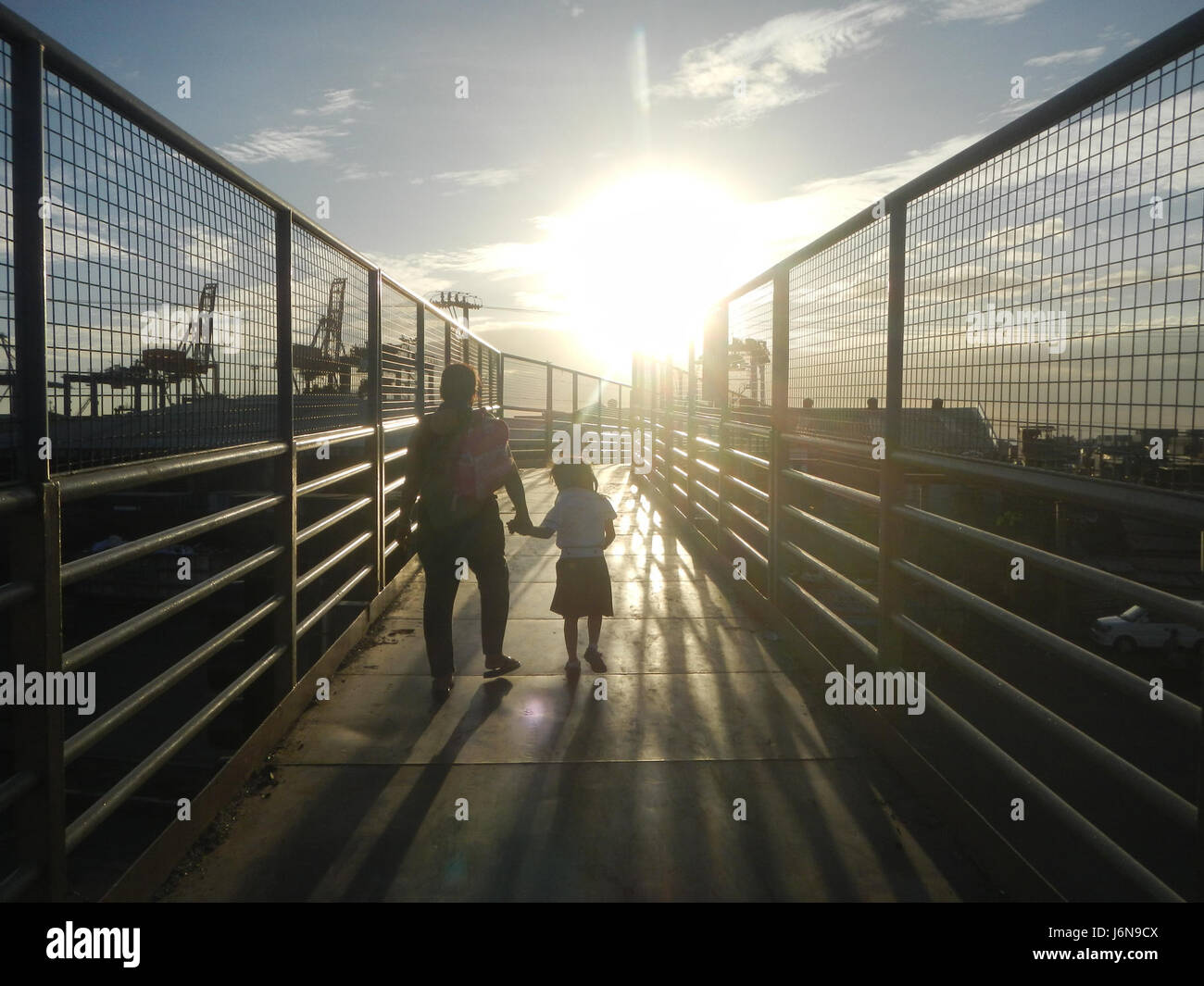 The image shows a pedestrian footbridge on Capulong Marcos Road in ...