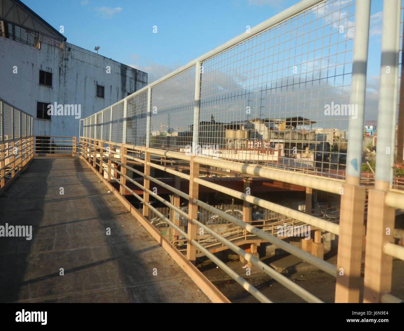 This title refers to a pedestrian footbridge located in the Tondo ...