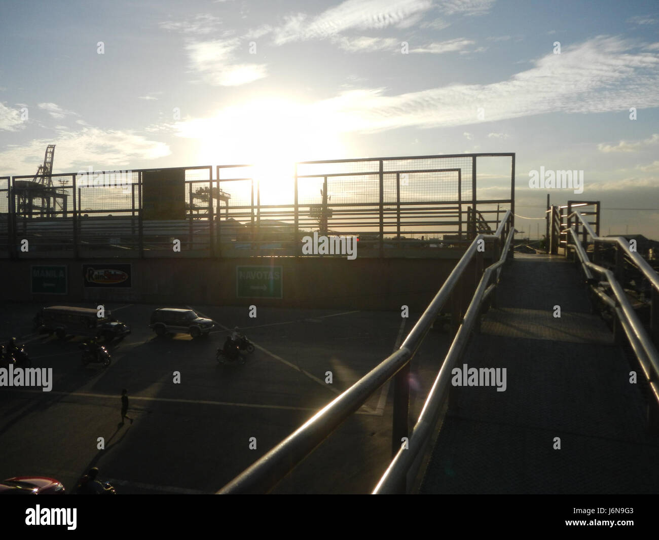 This image shows the pedestrian footbridge located along Capulong ...