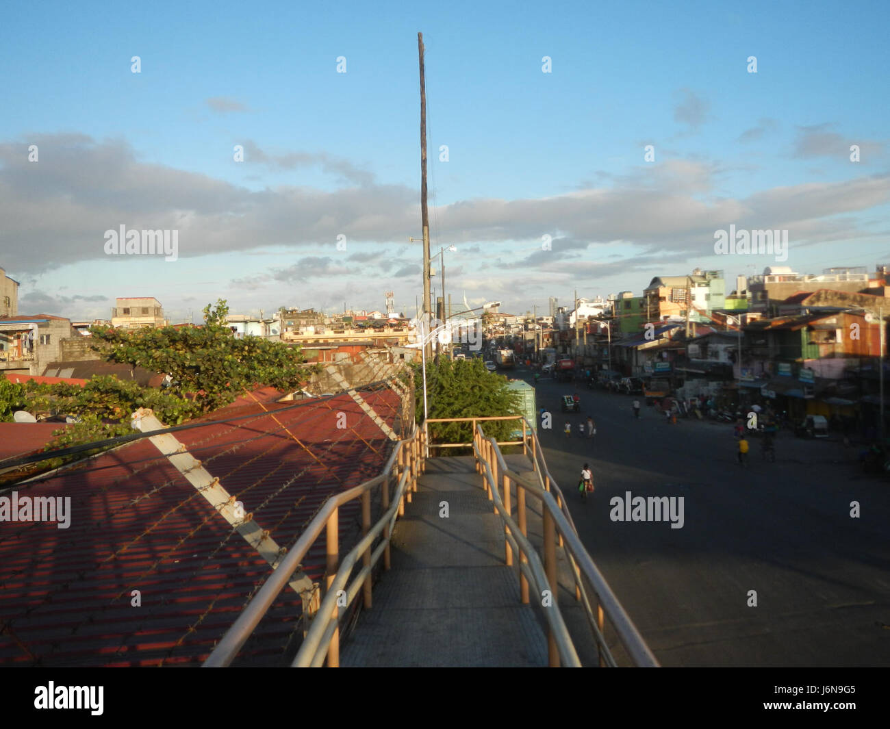 This pedestrian footbridge is located on Capulong Marcos Road, Radial ...